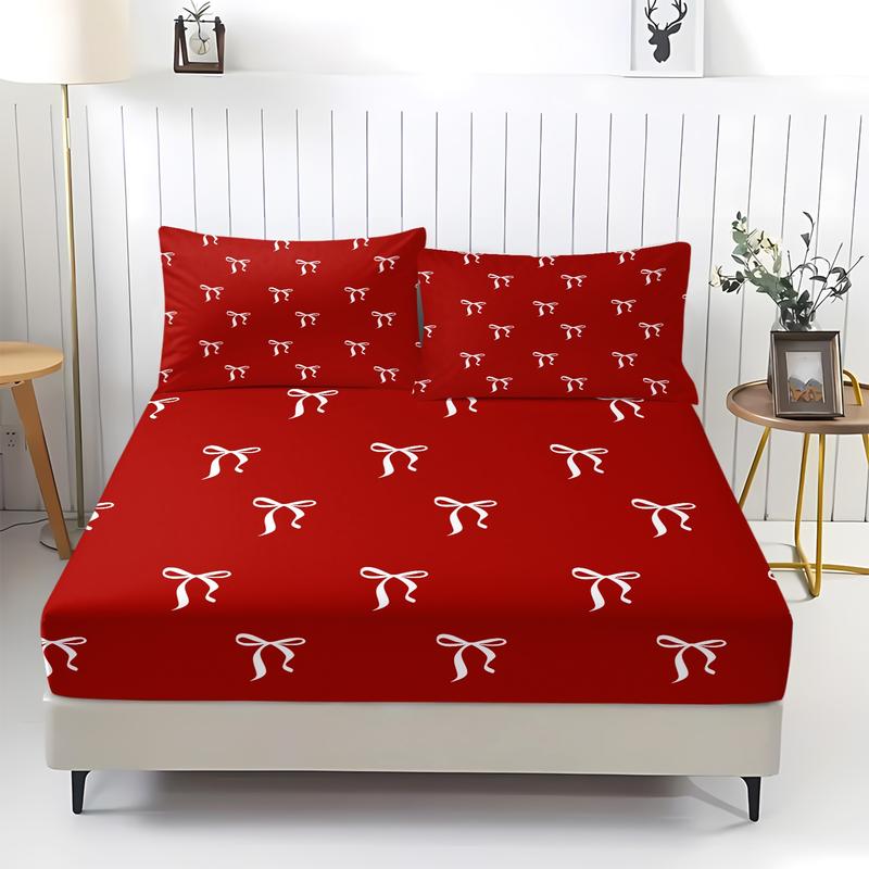 A vibrant red fitted sheet set with a bow-print fitted sheet 3-piece ...