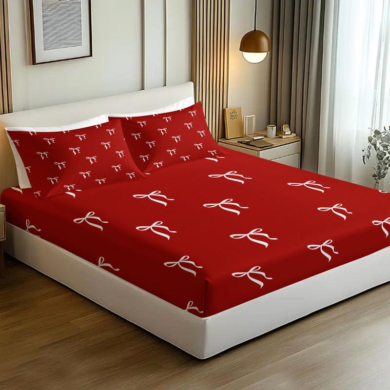 A vibrant red fitted sheet set with a bow-print fitted sheet 3-piece ...